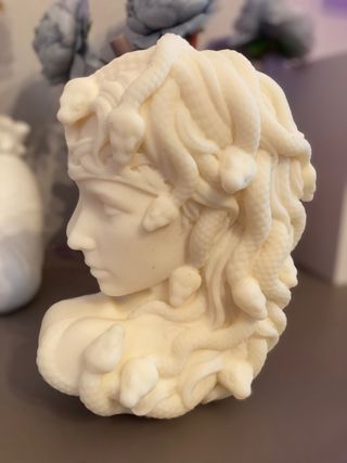 Candela donna .Testa medusa . Testa donna .
