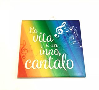 Piastrella in ceramica con decorazione e frase