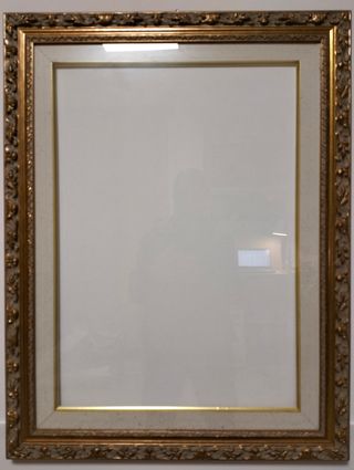 Cornice dorata con vetro