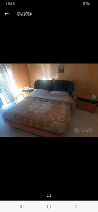 Camera da letto stile moderno