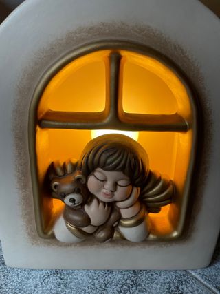 Thun - lampada con angelo alla finestra