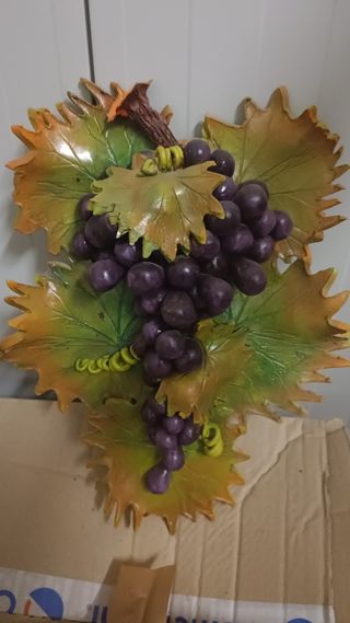 foglia con grappolo d'uva