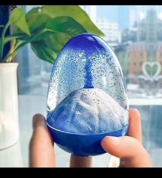 Clessidra Liquida a forma di eruzione vulcanica