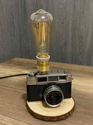 Macchina fotografica lampada