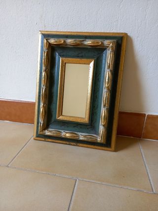 Specchio con cornice in legno