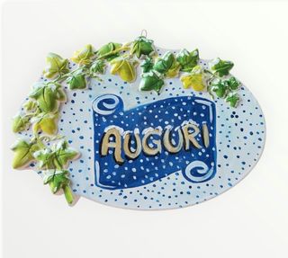 Scritta Auguri su placca in gesso con disegno eder