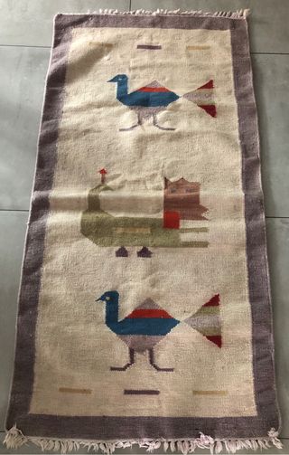 Tappeto in tessuto motivo animali