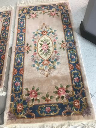 Tre tappeti orientali uguali