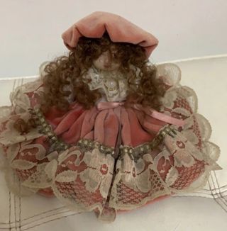 Bambola in porcellana