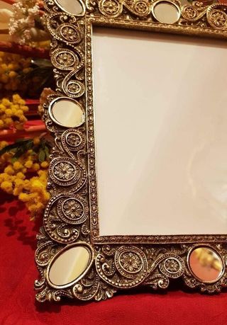 cornice portafoto con specchi inglobati