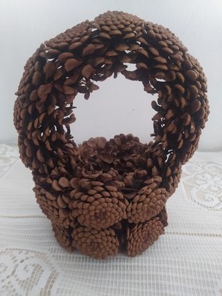 vintage hand made pine cone basket.