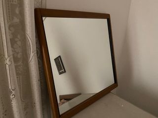 specchiera con bordo in legno