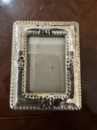 Cornice in argento