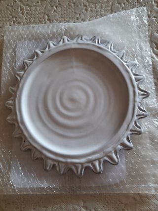 Sottopiatto in ceramica nuovo