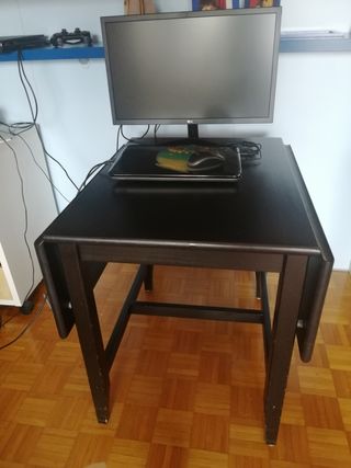 Tavolo in legno nero con ante pieghevoli