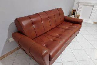 Divano in pelle apribile con materasso