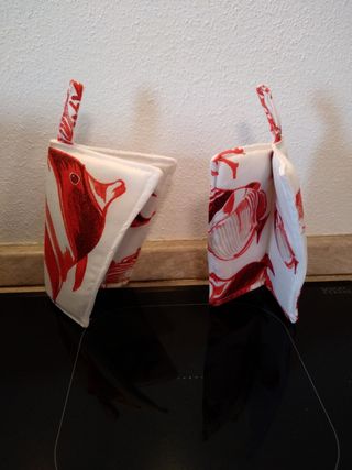 Presine da cucina con decorazioni pesciolini