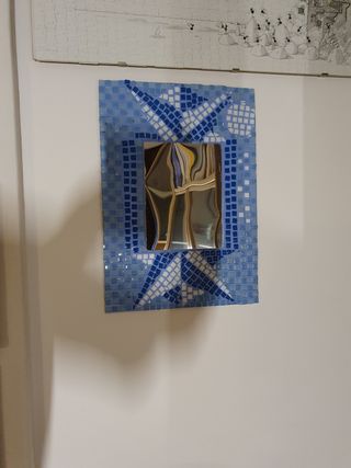 mosaico con specchio
