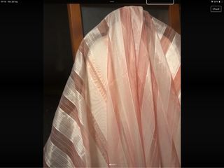 Tenda rosa arricciata in alto