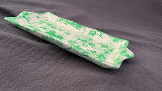 Portaoggetti con pennellate verdi