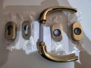 Maniglie per porte Ghidini oro/argento