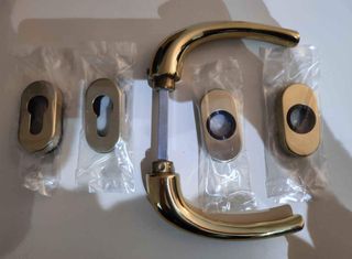 Maniglie per porte Ghidini oro/argento