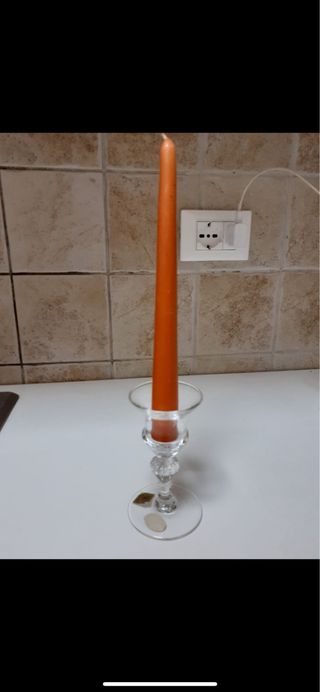 Portacandele con candela nuovi