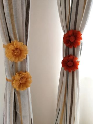 2 coppie di fermi per tende