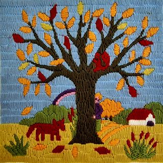 Tela ricamata a mano a punto croce