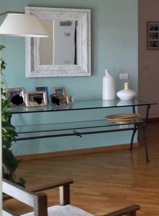 tavolo in cristallo e ferro battuto