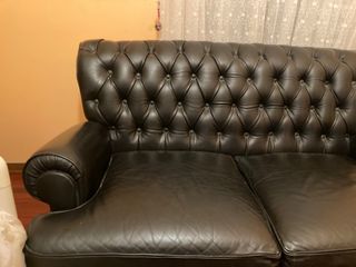 divano Chesterfield nero pelle