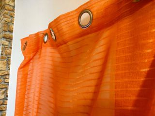 Tenda arancione con anelli 140x210 cm