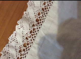 Copricuscino in lino ricamato a mano