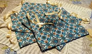 N 4 copricuscini in cotone stampato