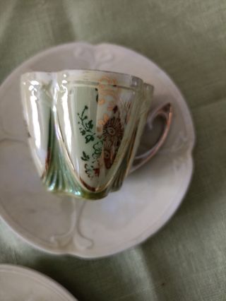 set tazzine e teiera in porcellana