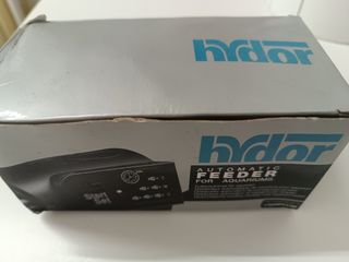 Distributore automatico mangime x pesci