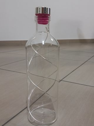 Bottiglia in vetro con tappo in argento