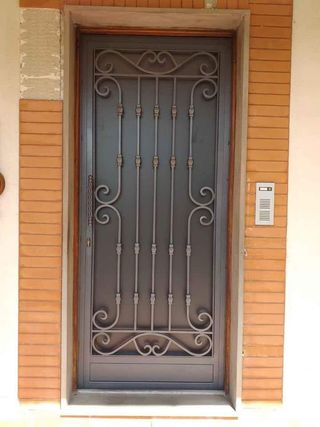 Porta d'ingresso in ferro battuto a mano