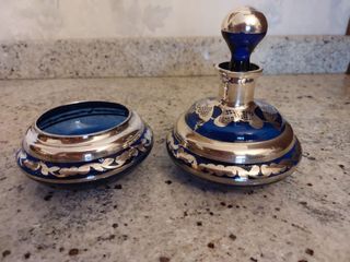 Vasetto e bottiglietta argento