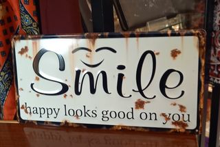 Targa in metallo smile