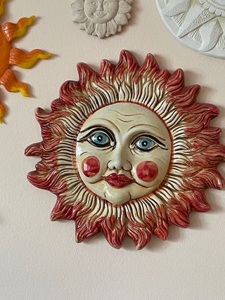 decorazione da parete a forma di sole
