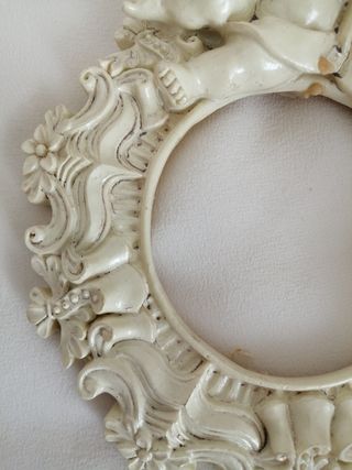 Cornice tonda con angioletto