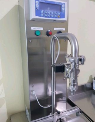 RIEMPITRICE AUTOMATICA CON BILANCIA ELET