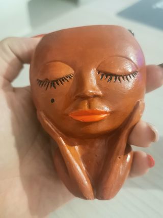 contenitore volto donna