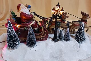 Babbo natale e 4 renne con movimento