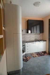 Cucina laccata lucida bianca e grigia