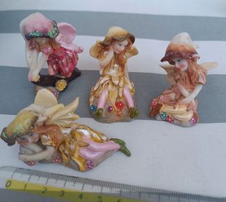 4 piccole fate in resina