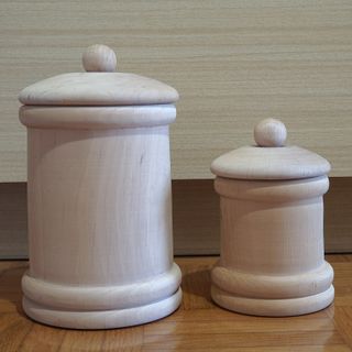 Set di due barattoli in legno grezzo