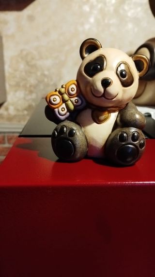 Panda con farfalla