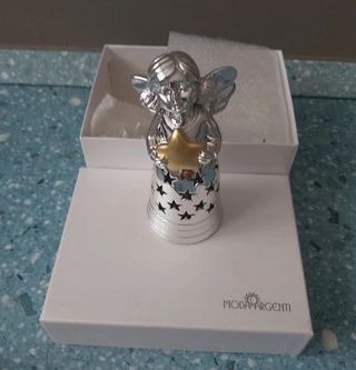 Statuina argento nuova con luce.